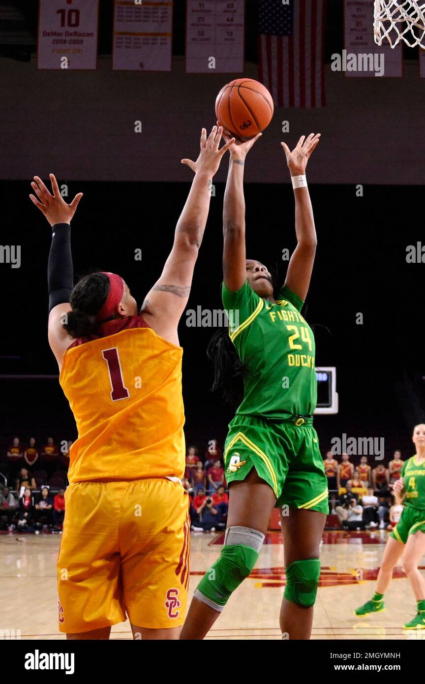 Oregon forward Ruthy Hebard, right, shoots as Southern California ...