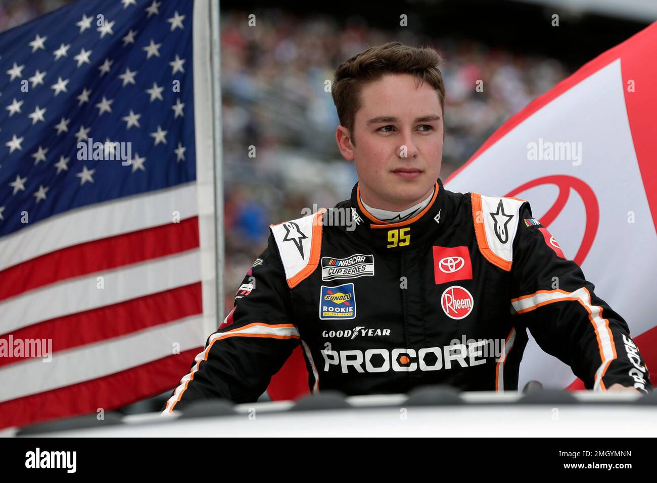 Christopher Bell takes a parade lap in front of fans before the NASCAR ...