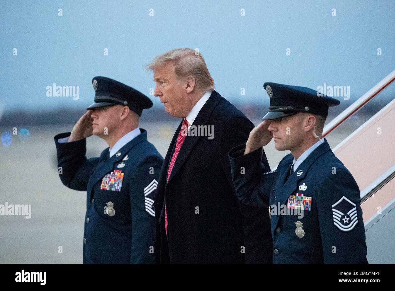 President Donald Trump steps off Air Force One as he arrives Sunday ...