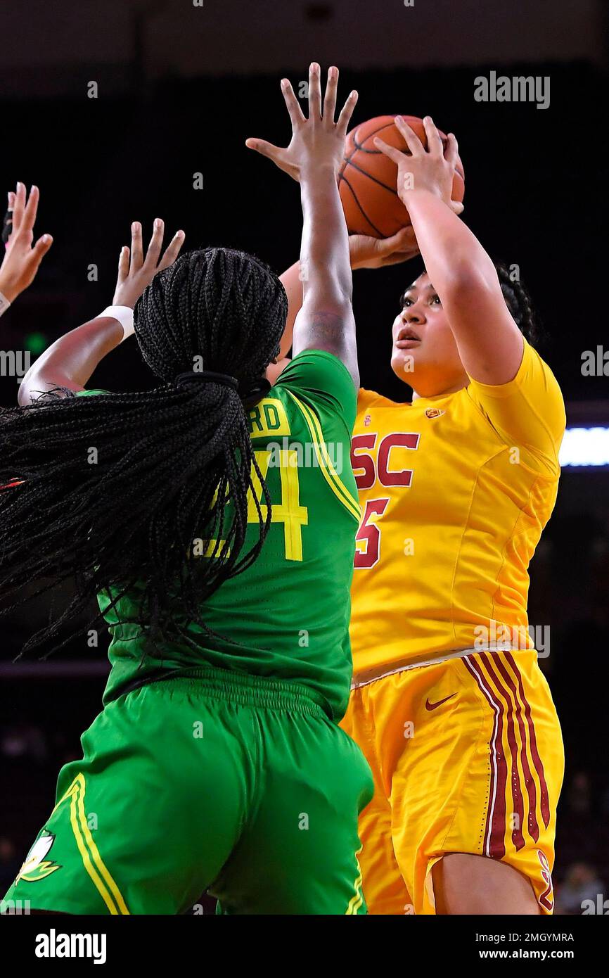 Southern California forward Alissa Pili, right, shoots as Oregon ...