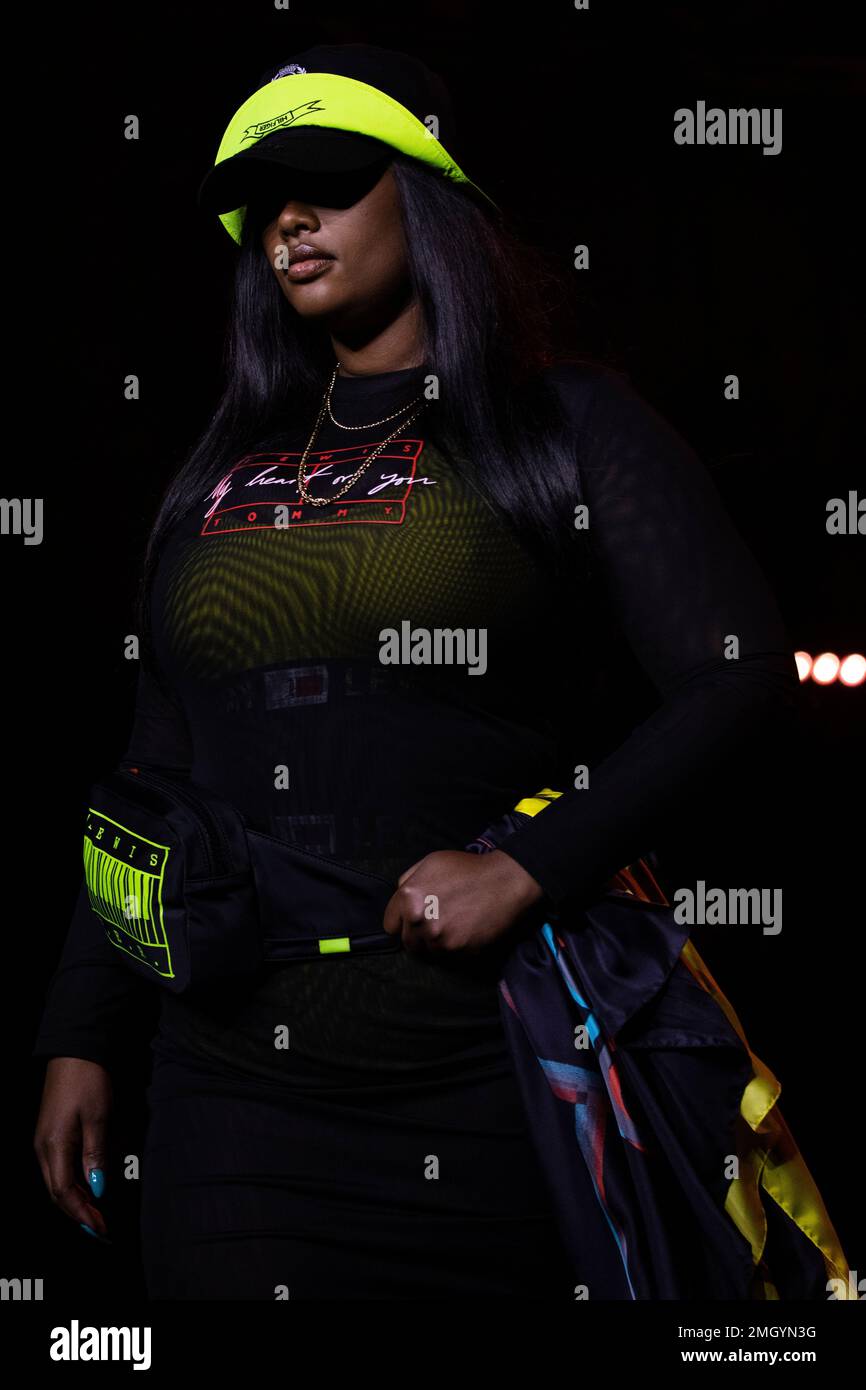 A model wears a creation by designer Tommy Hilfiger at the Autumn ...