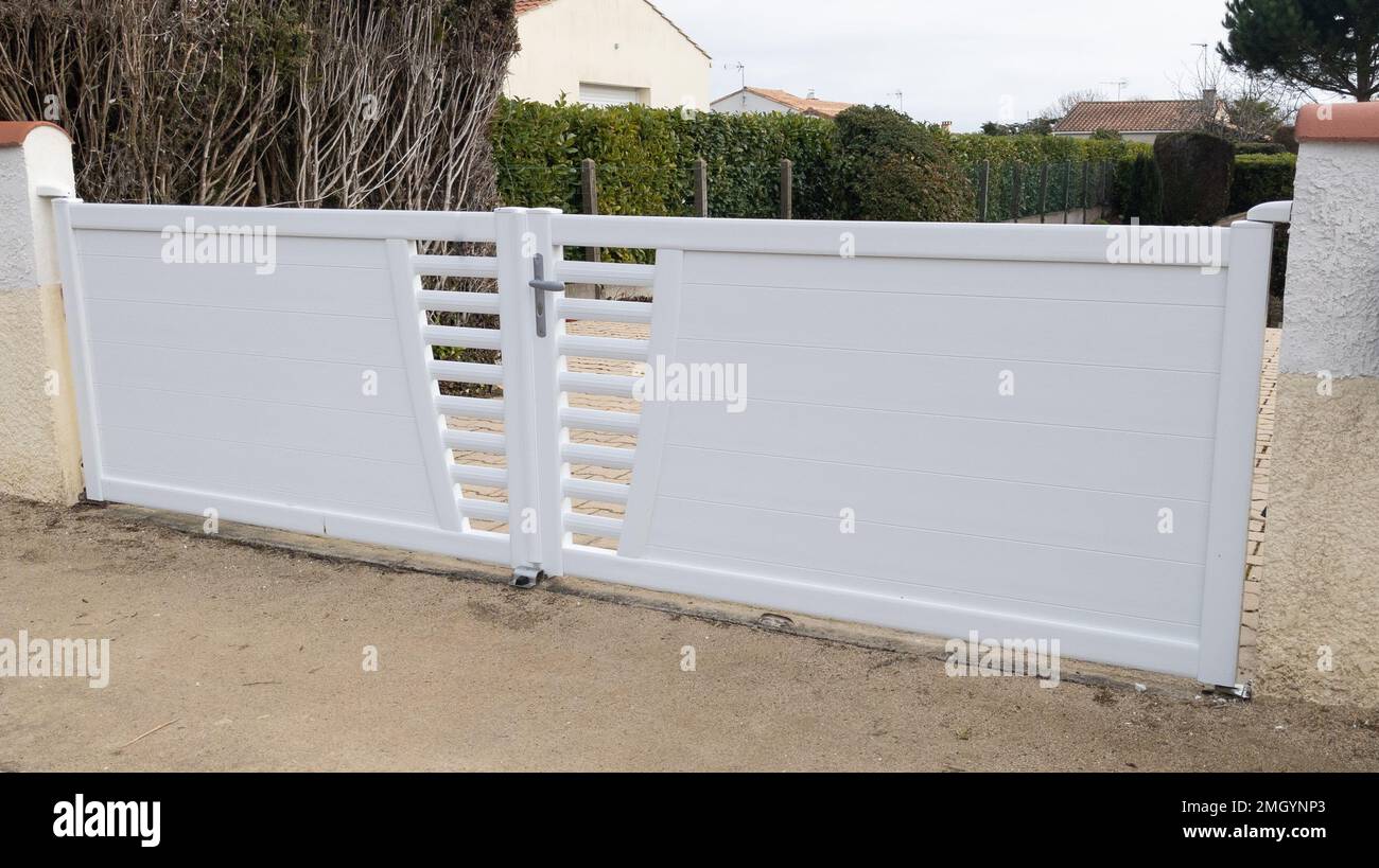 modern steel metal gate white fence of home suburb street access house ...