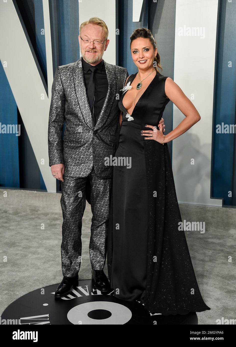 Actor Jared Harris, left, and wife Allegra Riggio arrive at the Vanity ...