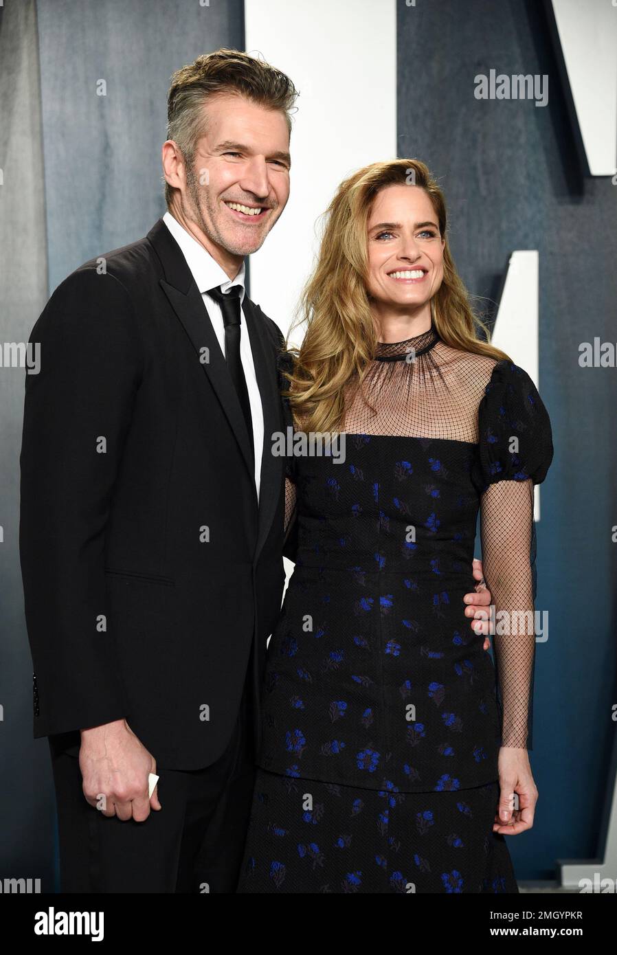 David Benioff, left, and wife Amanda Peet arrive at the Vanity Fair ...