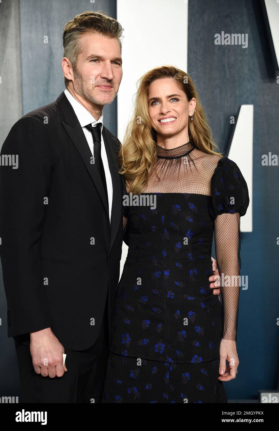 David Benioff, left, and wife Amanda Peet arrive at the Vanity Fair ...