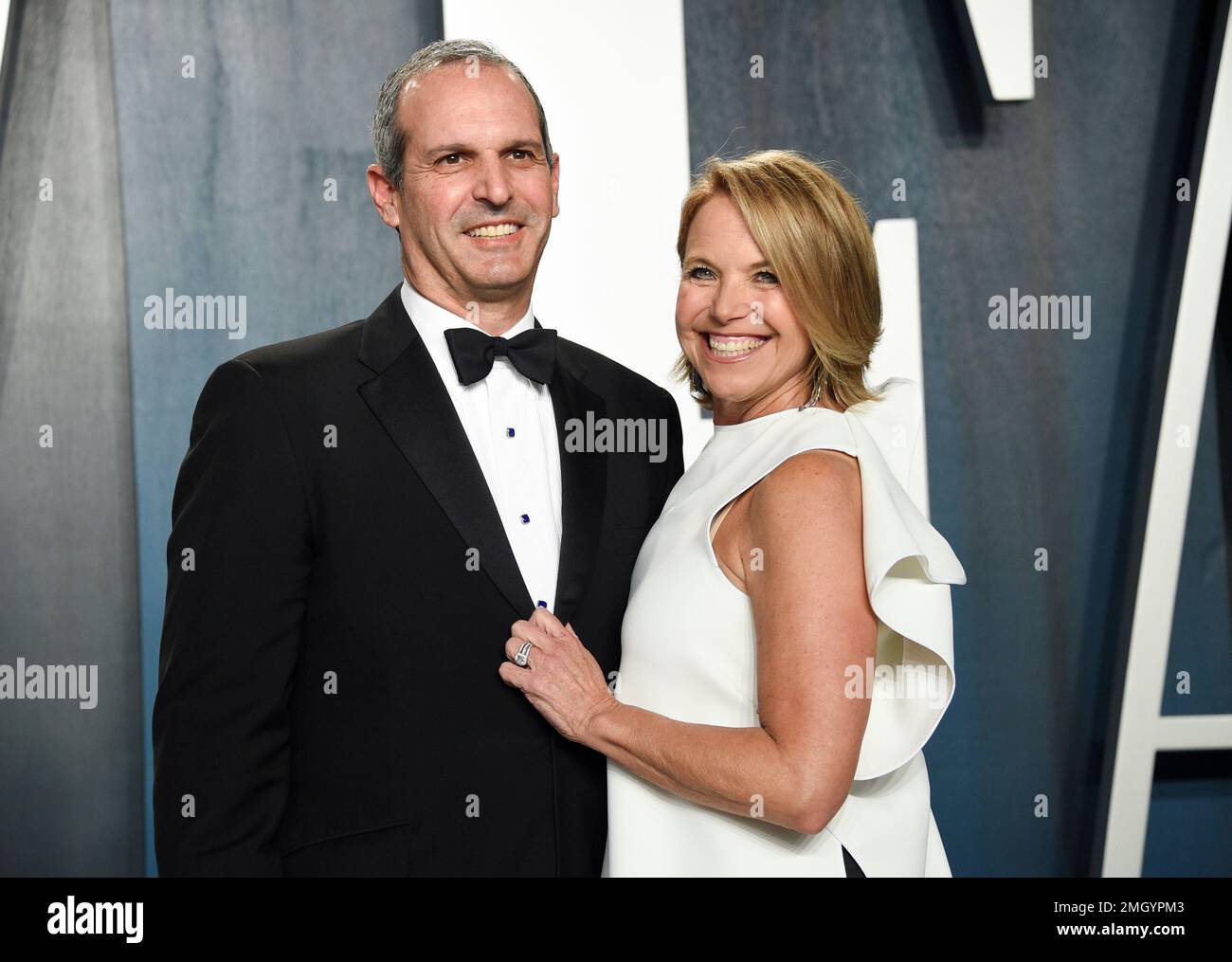 John Molner, left, and wife Katie Couric arrive at the Vanity Fair ...