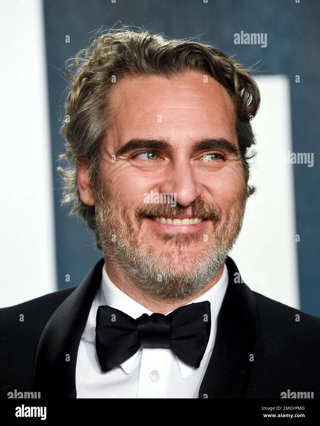 Actor Joaquin Phoenix arrives at the Vanity Fair Oscar Party on Sunday ...
