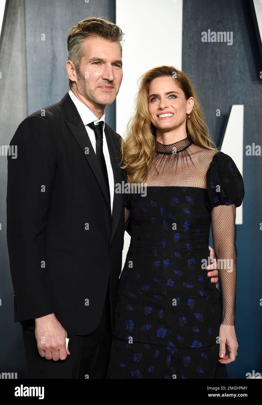 David Benioff, left, and wife Amanda Peet arrive at the Vanity Fair ...