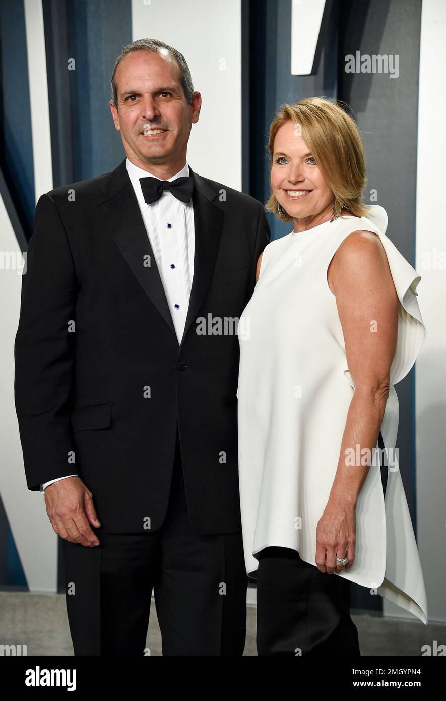 John Molner, left, and wife Katie Couric arrive at the Vanity Fair ...