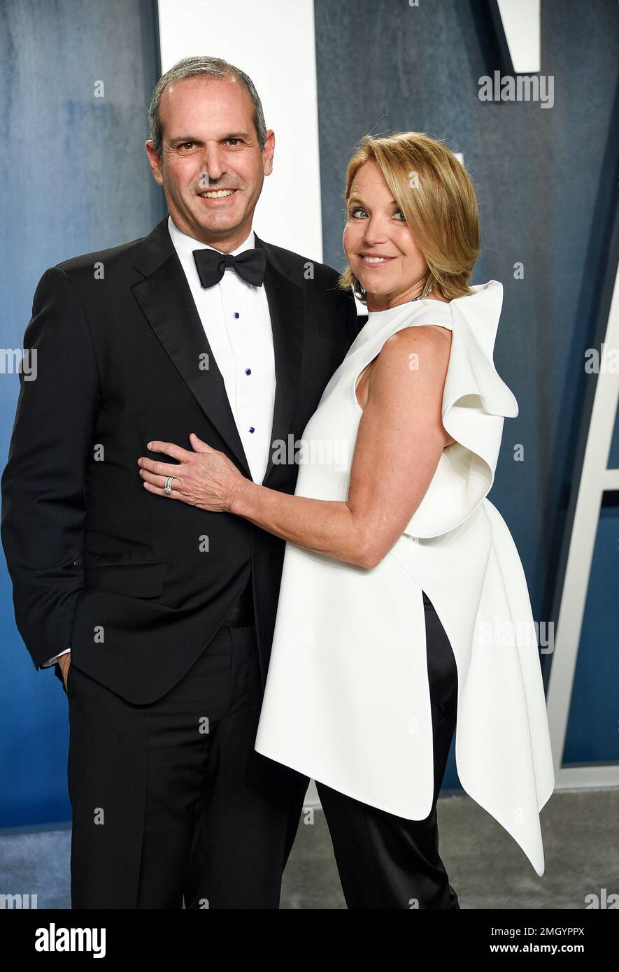 John Molner, left, and wife Katie Couric arrive at the Vanity Fair ...