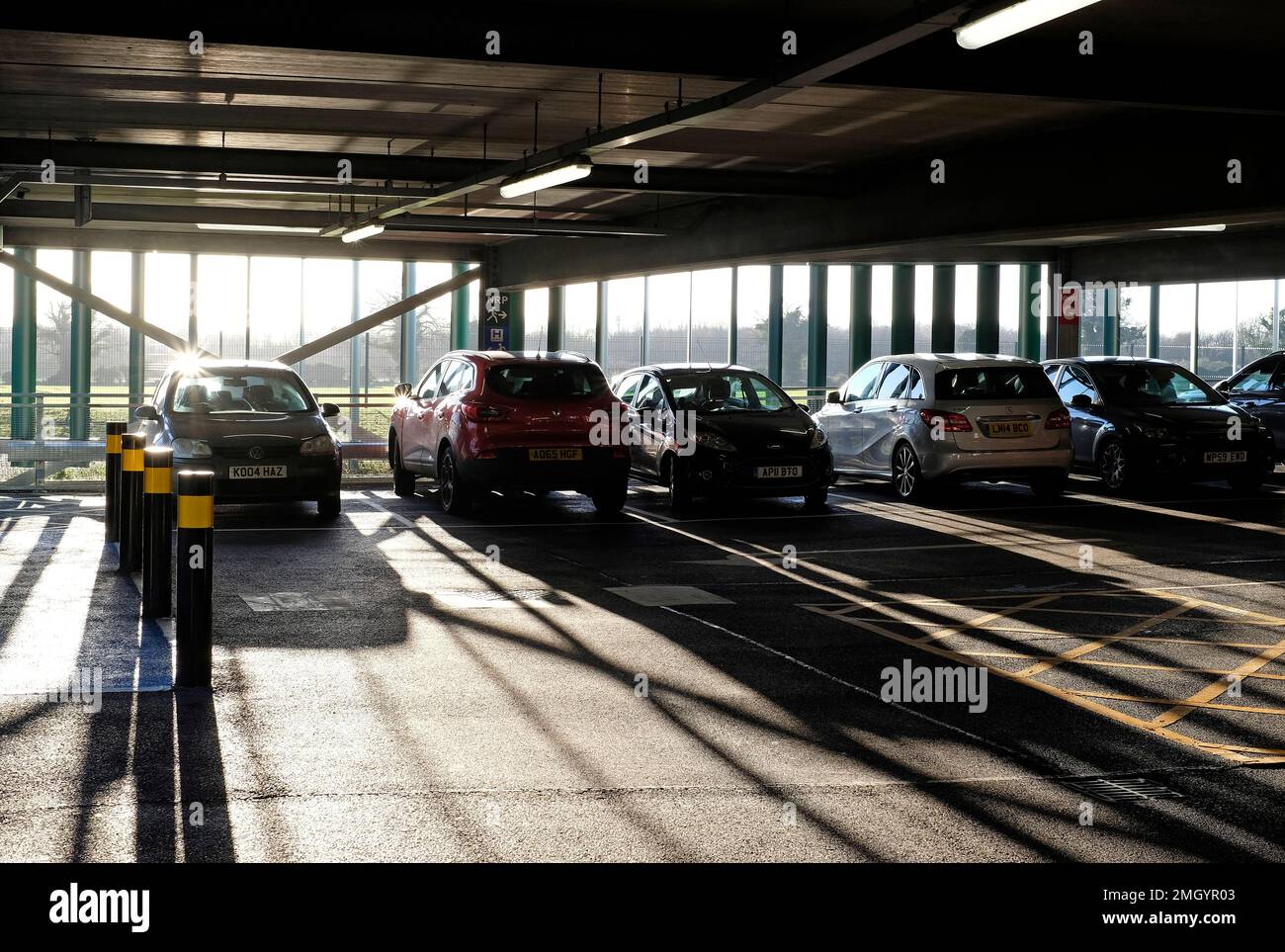 cars parked in multi-storey carpark, norfolk, england Stock Photo - Alamy