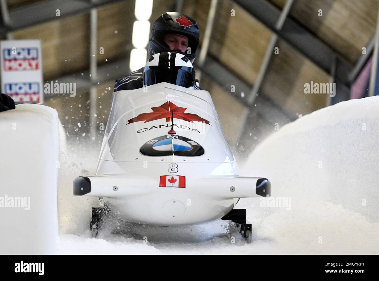 Justin Kripps and Samuel Giguere of Canada finish their second run of ...