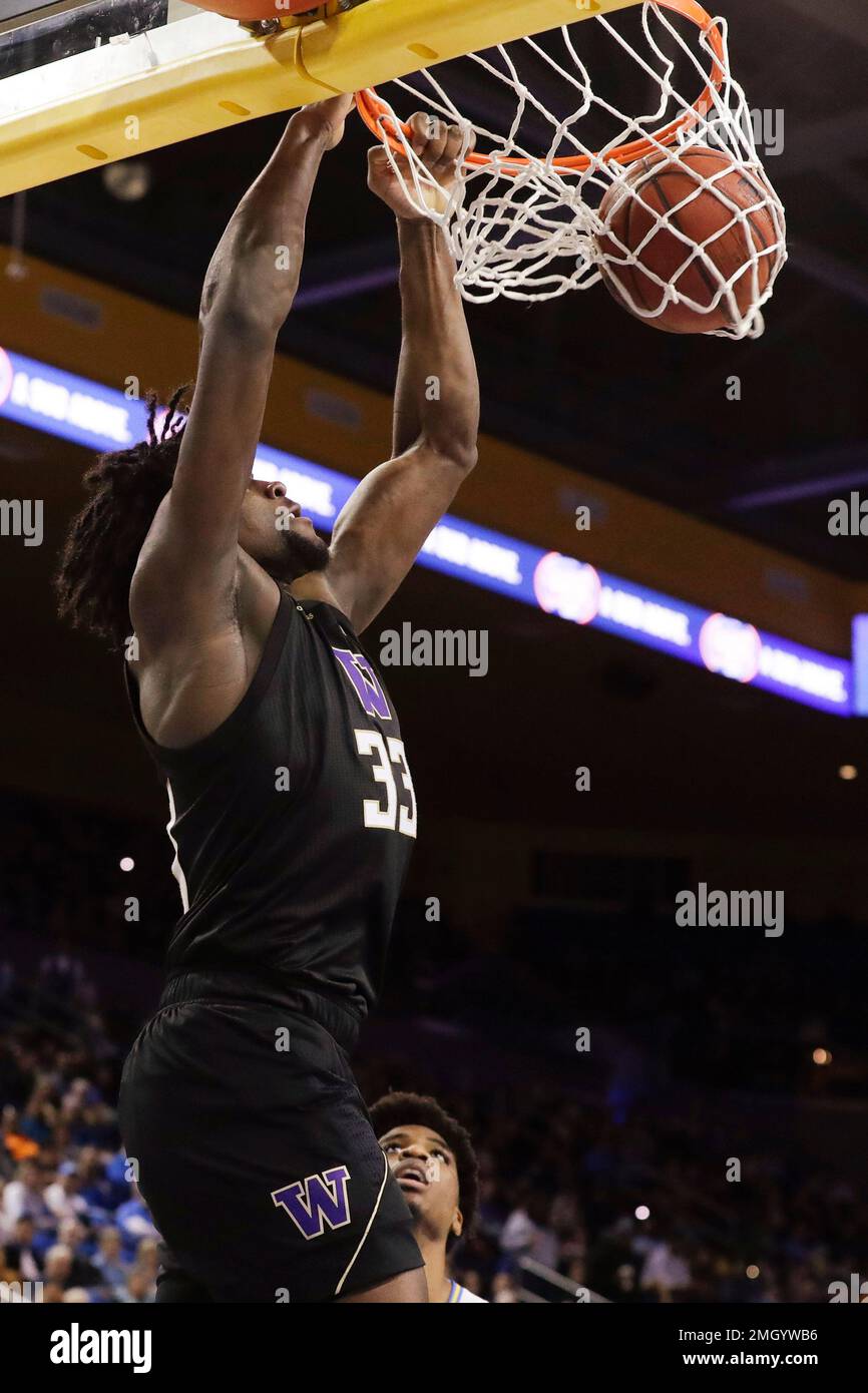 Washington forward Isaiah Stewart dunks against UCLA during the second ...