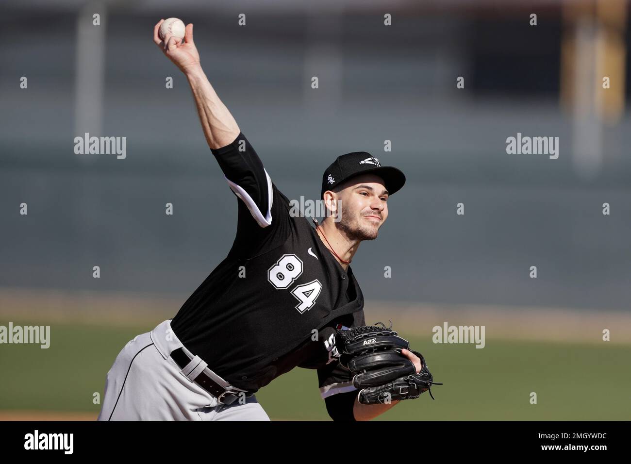 Chicago White Sox pitcher Dylan Cease throws during spring training ...