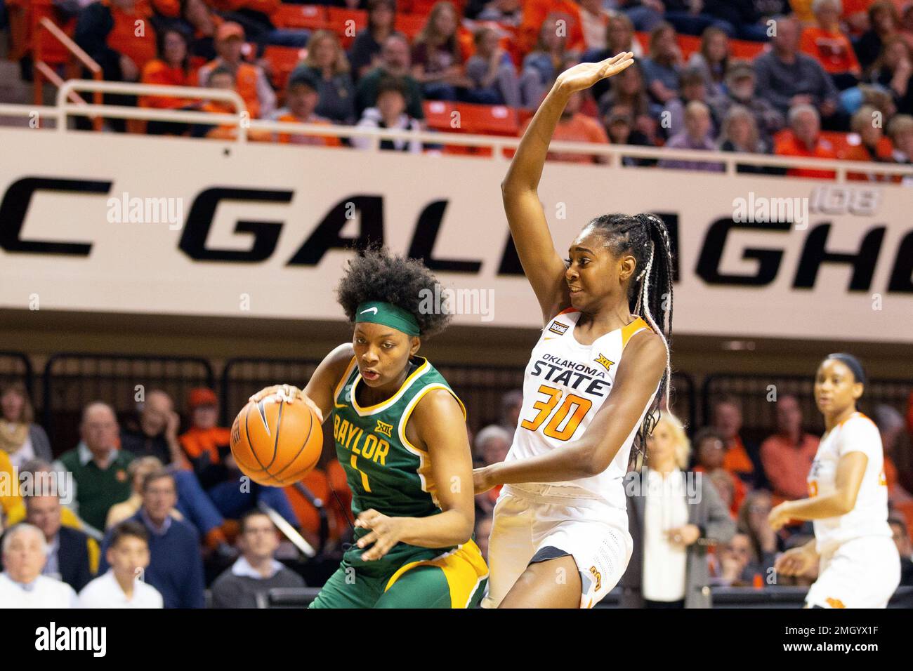 Baylor forward NaLyssa Smith (1) drives past Oklahoma State guard Sara ...