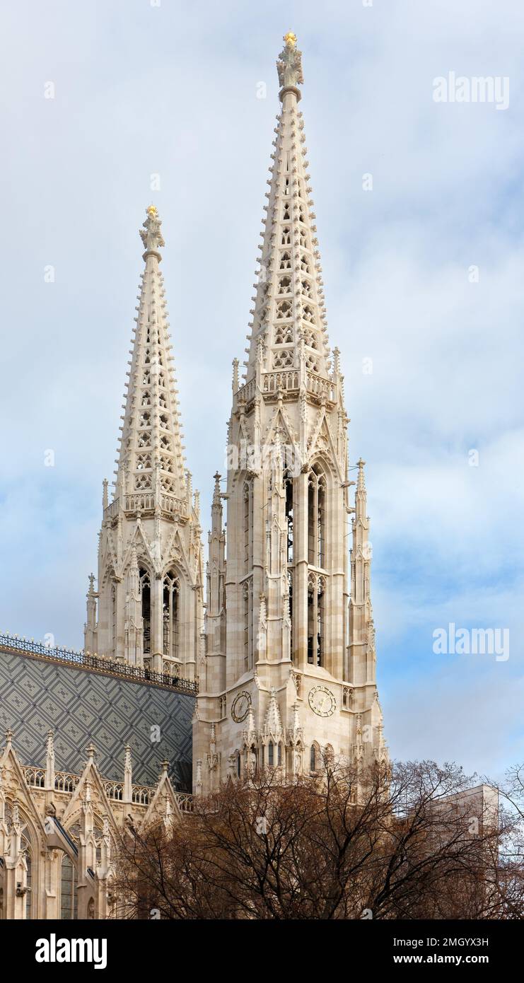 The two bell towers of the Neo-gothic Votive Church in Vienna, Austria ...