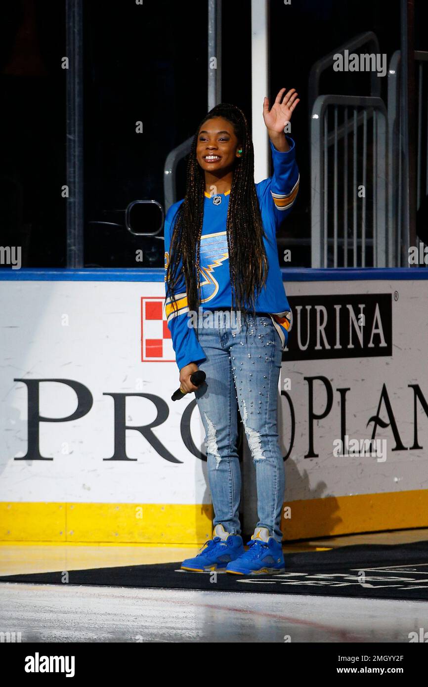St. Louis native and 'The Voice' contestant Kennedy Holmes waves to the ...