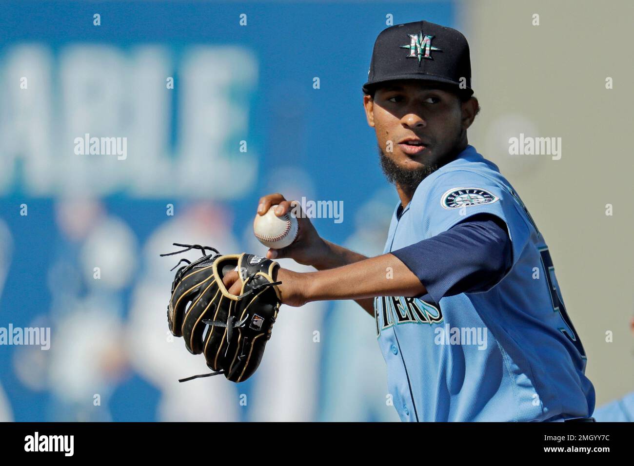 Seattle Mariners pitcher Yohan Ramirez throws during spring training ...