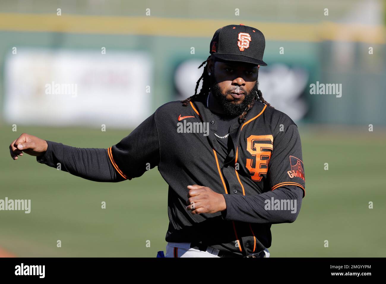 San Francisco Giants' Johnny Cueto stretches during spring training ...