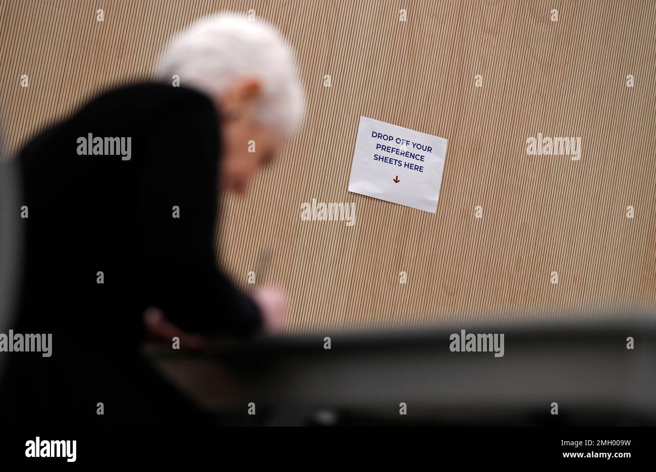 A sign advertises where to drop you ballot as Landra Reid, wife of ...