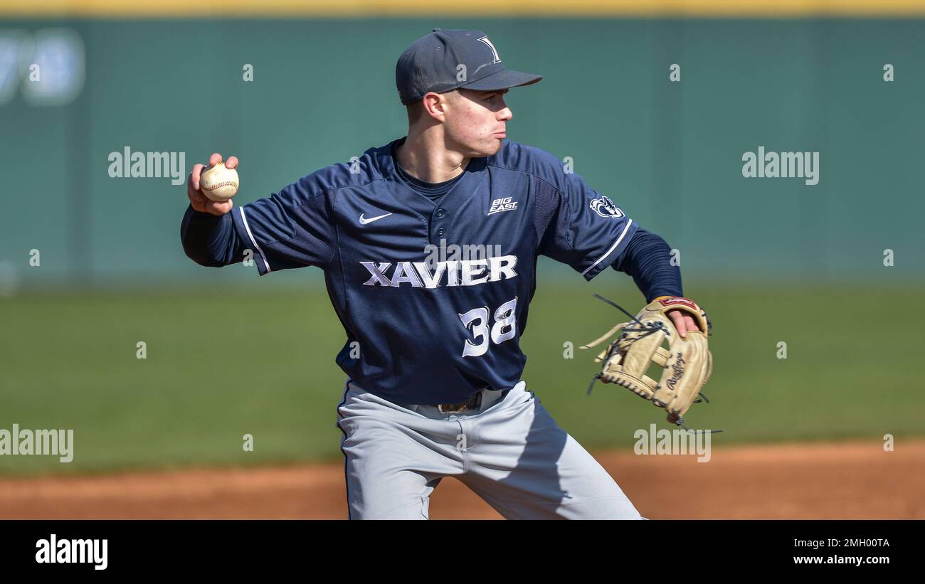 Xavier third baseman Jack Housinger plays in an NCAA baseball game ...