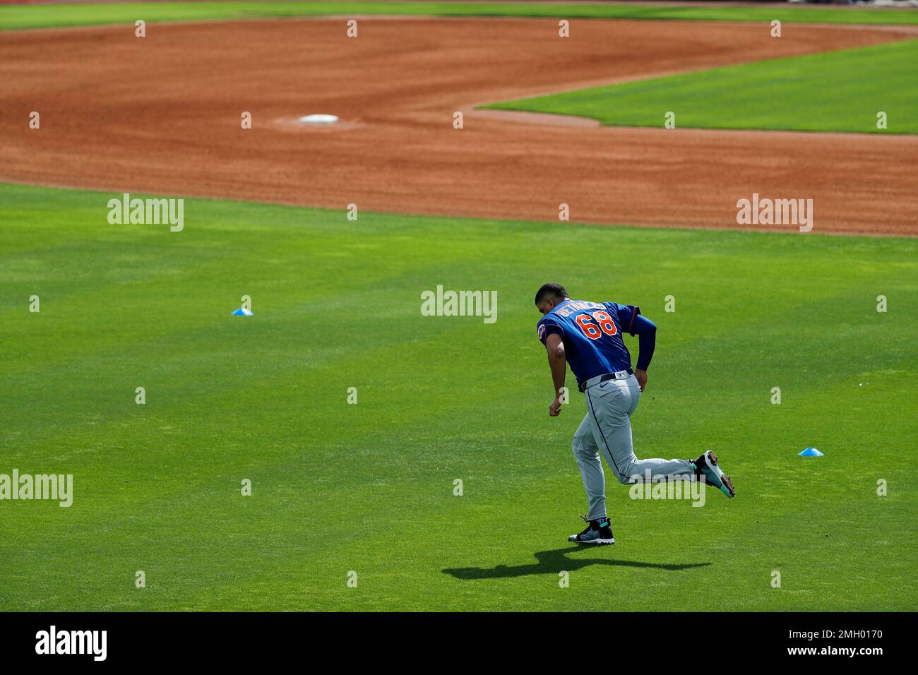 New York Mets pitcher Dellin Betances runs sprints during spring ...