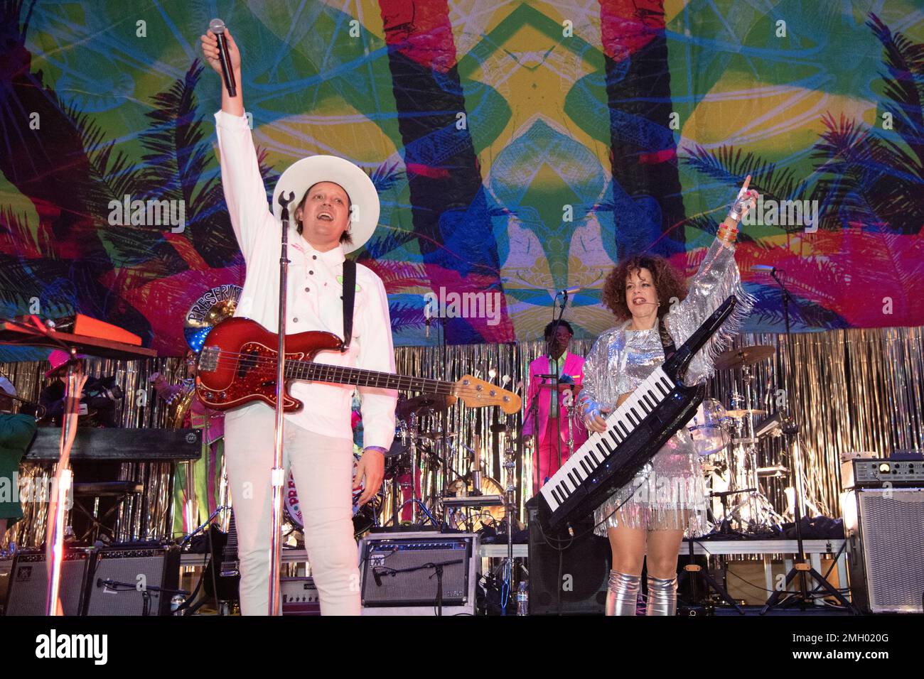 Win Butler, left, and Regine Chassagne of Arcade Fire perform at the ...