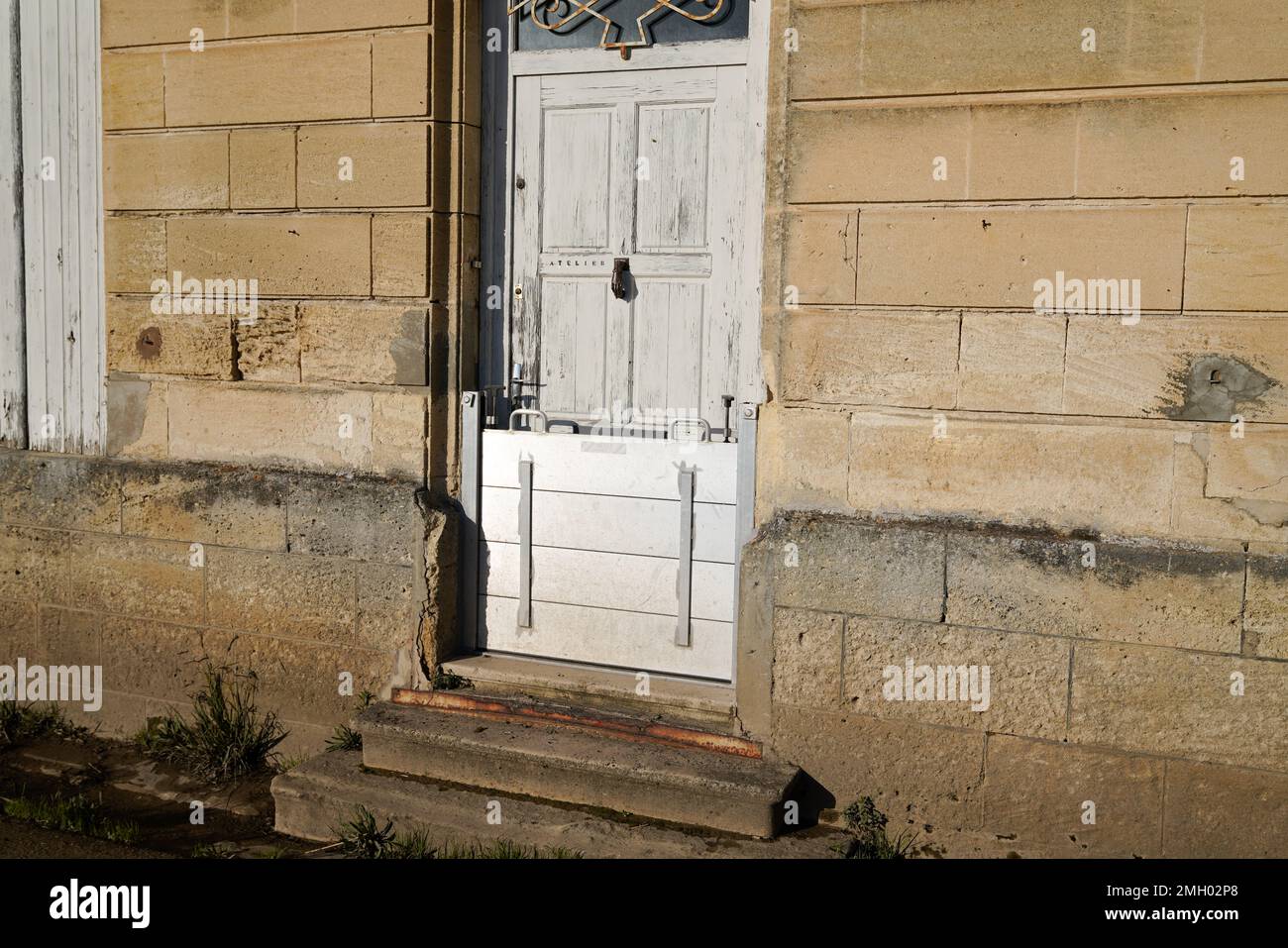 wooden flood door protection wood barrier Stock Photo - Alamy