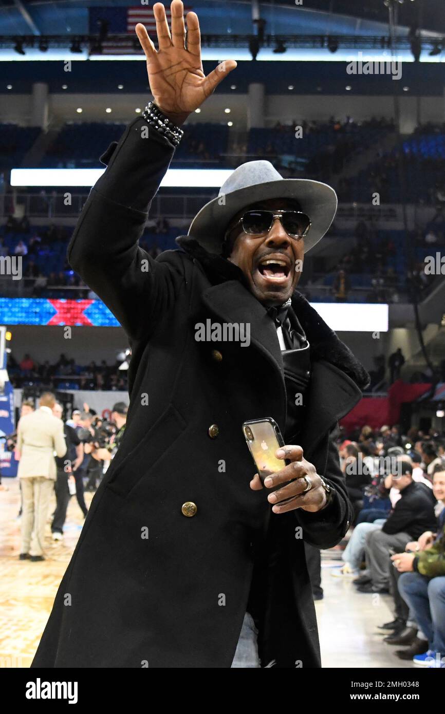 Actor J. B. Smoove waves to the crowd before the NBA Celebrity All-Star ...