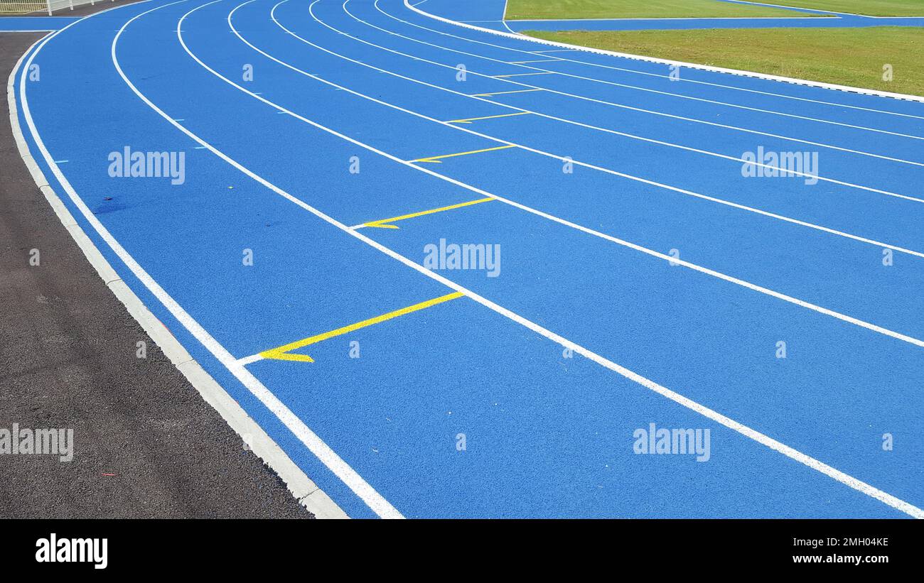 blue race stadium and running track curve detail for outdoor athletics ...