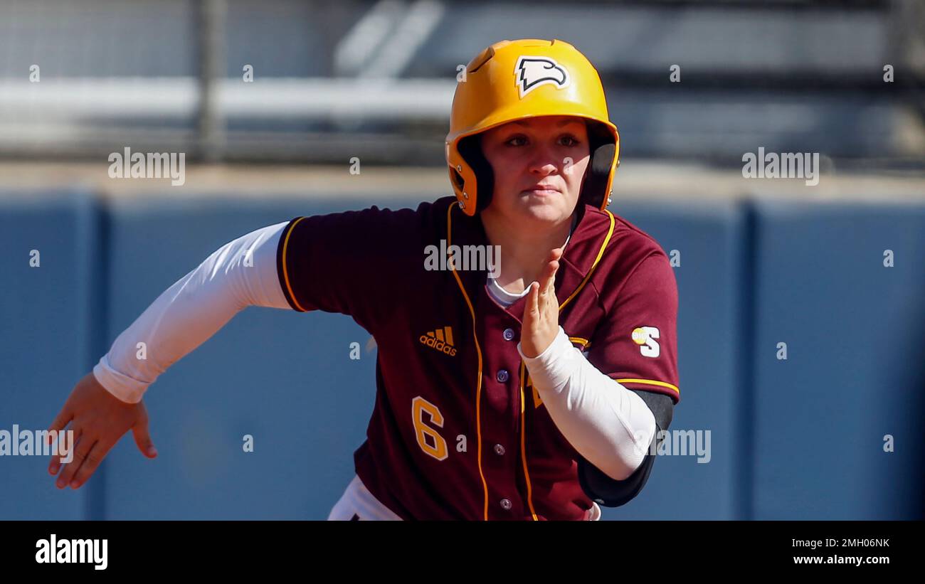 Winthrop's Chloe Baker (6) runs to first during a college softball game ...