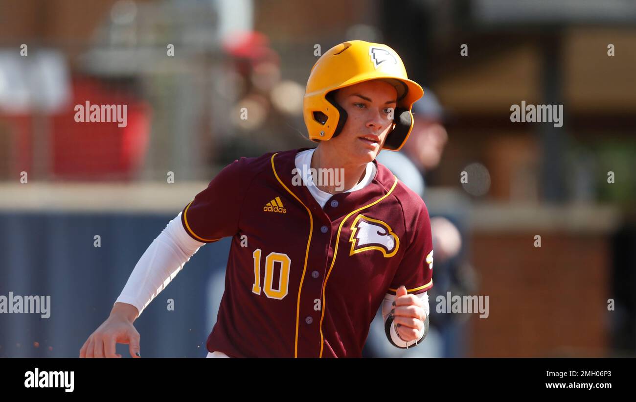 Winthrop's Logan Webb (10) runs to first during a college softball game ...