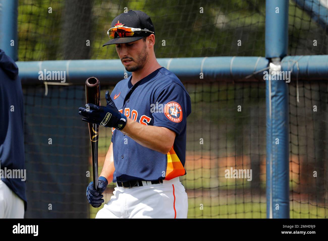 Houston Astros catcher Garrett Stubbs looks at his bat during spring ...