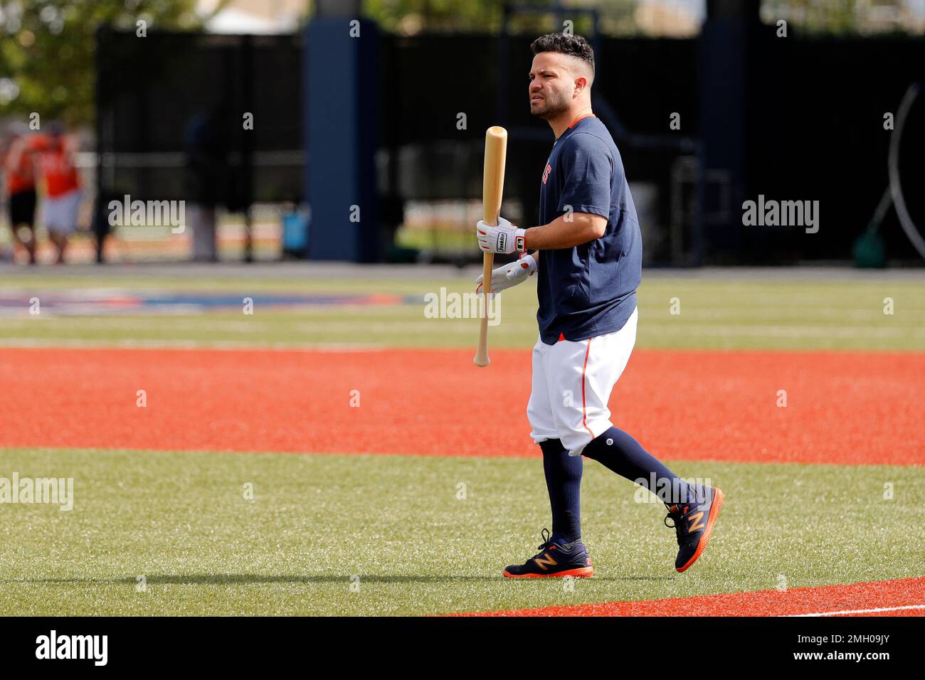 Houston Astros' Jose Altuve holds a bat during spring training baseball ...