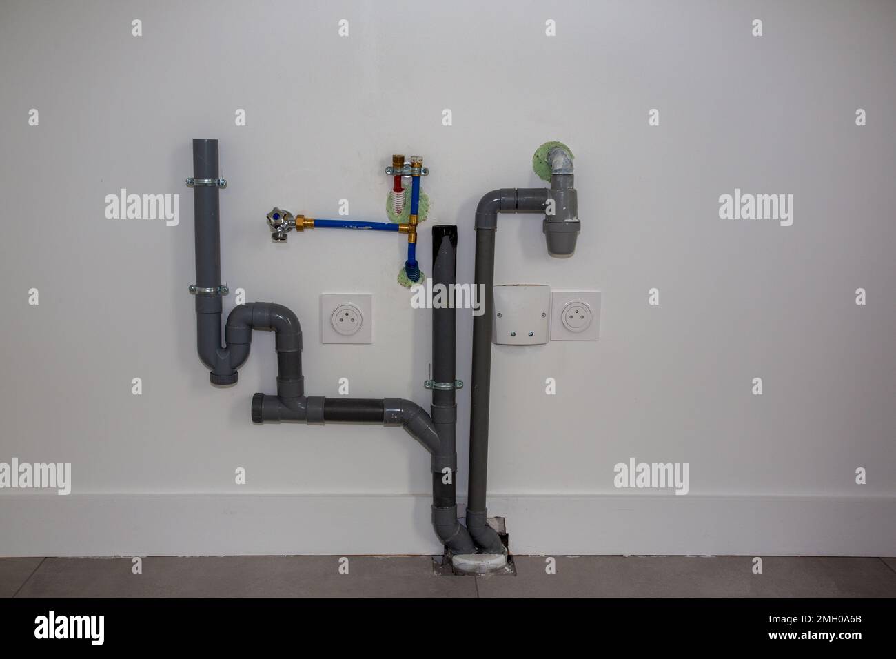 water inlet and drain pipe in a new house inside installation of ...