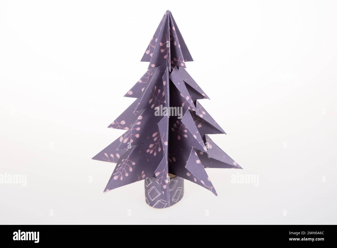 Handmade origami paper craft pine Christmas tree on white Stock Photo ...