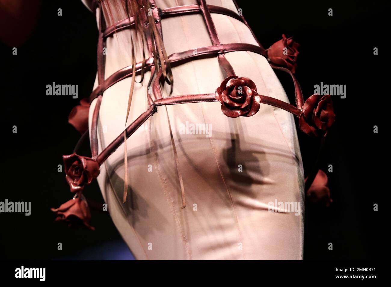A model displays a design partially made of chocolate in a fashion show ...