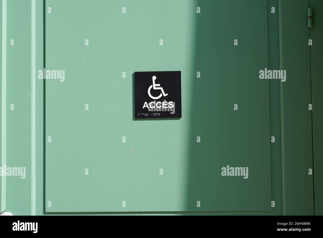 disabled sign logo on door entrance store access pictogram on street ...