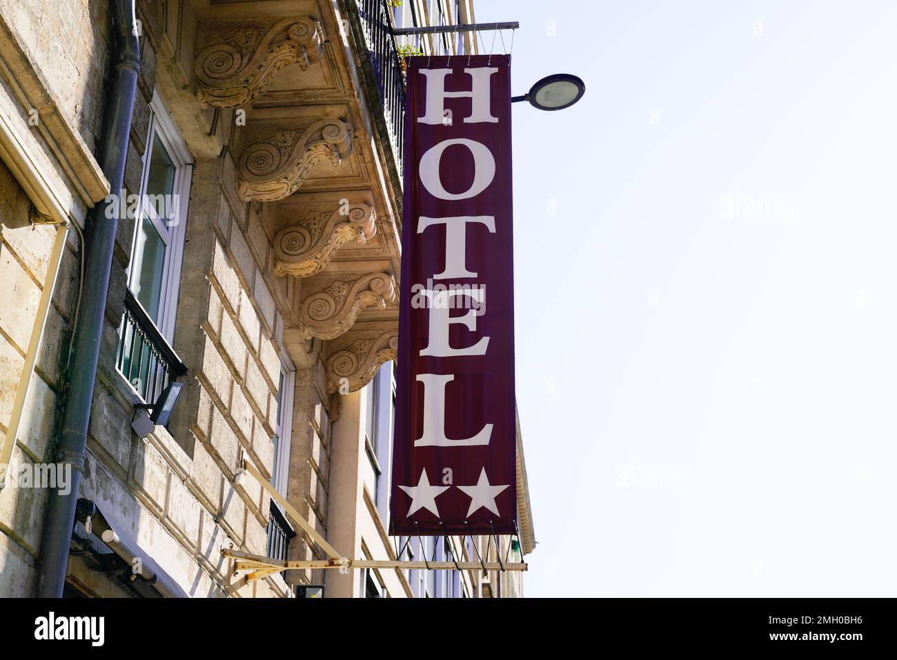Hotel light sign text and two stars on Building in tourist city Stock ...