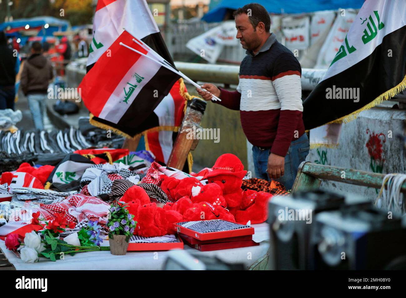 A street vendor sells Valentine's Day gifts in Baghdad, Iraq, Thursday ...