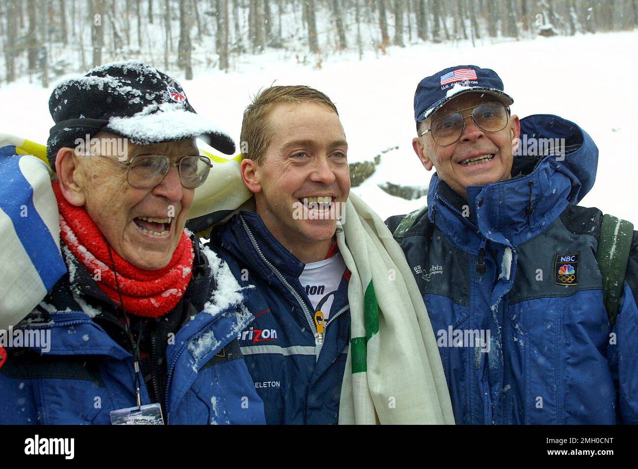 FILE - In this Dec. 20, 2001, file photo, Jim Shea, center, stands with ...