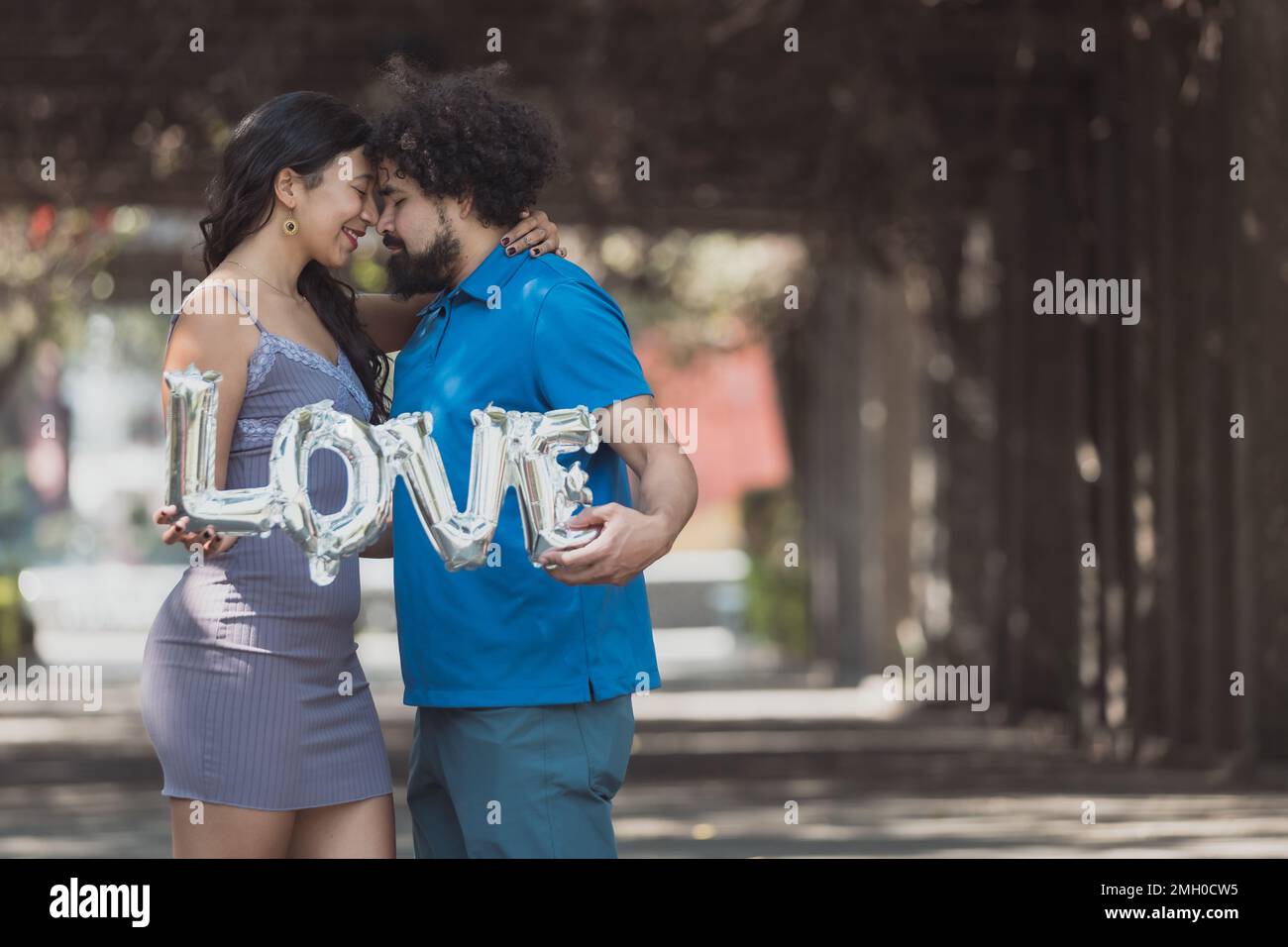 face to face Mexican young couple, real love concept Stock Photo - Alamy