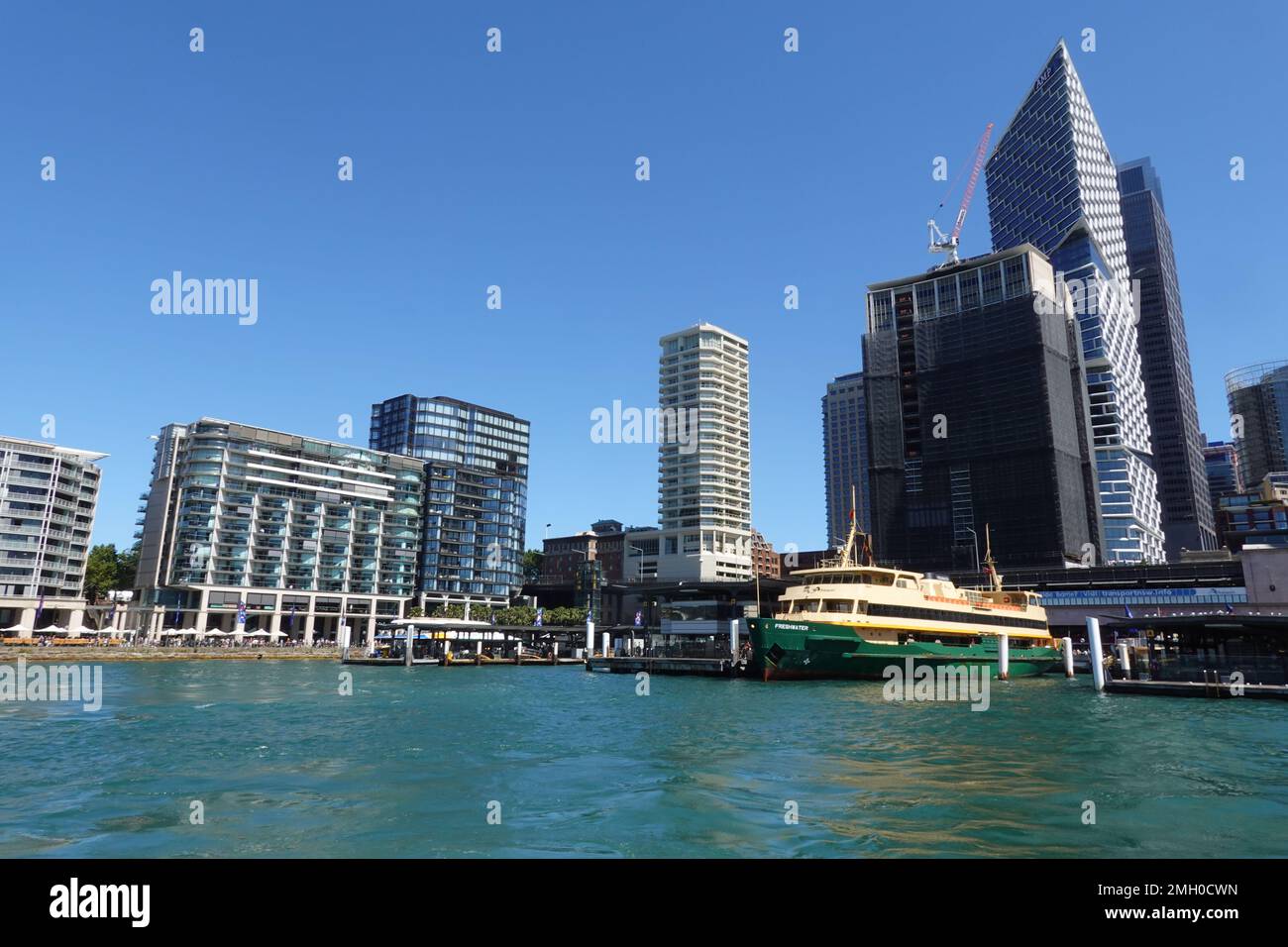 Circular Quay and the Sydney skyline seen from Sydney harbour ferry ...