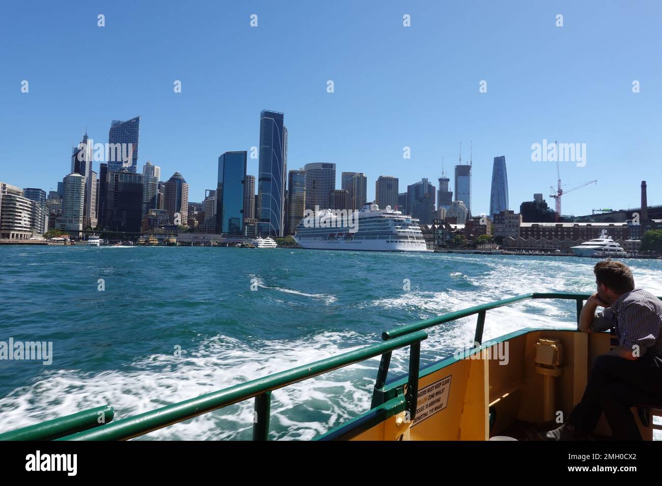 Circular Quay and the Sydney skyline seen from Sydney harbour ferry ...