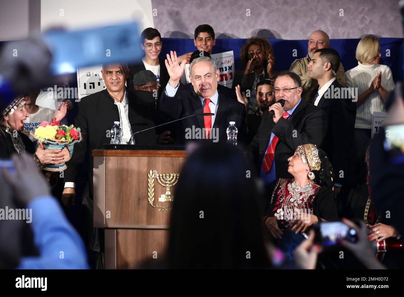 Israeli Prime Minister Benjamin Netanyahu waves to his supporters ...