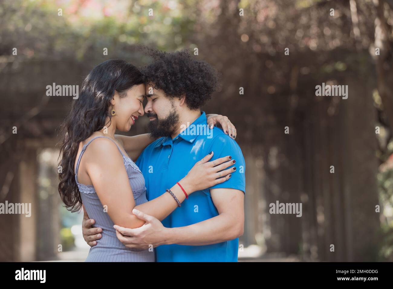 face to face mexican young couple, real love concept Stock Photo - Alamy