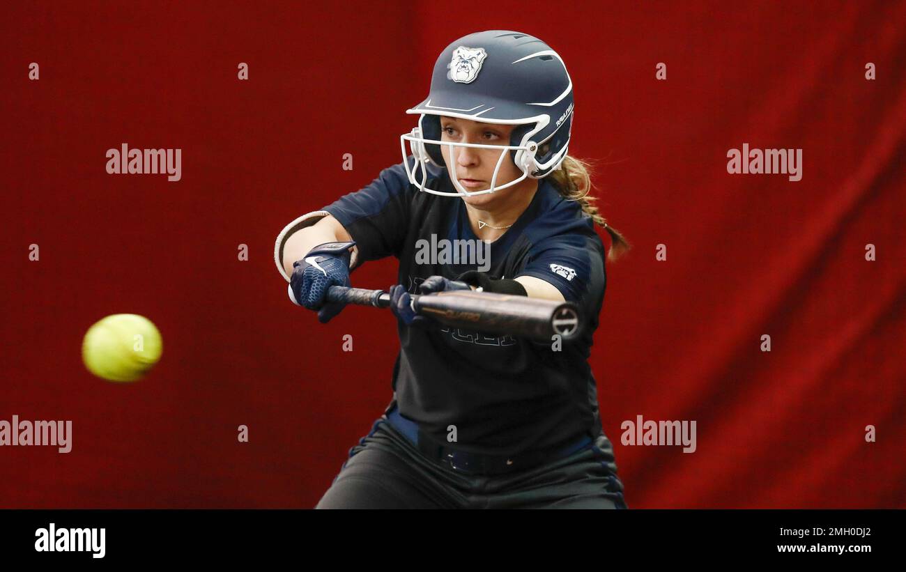 Butler's Lauren Fey bunts against Green Bay during an NCAA softball ...
