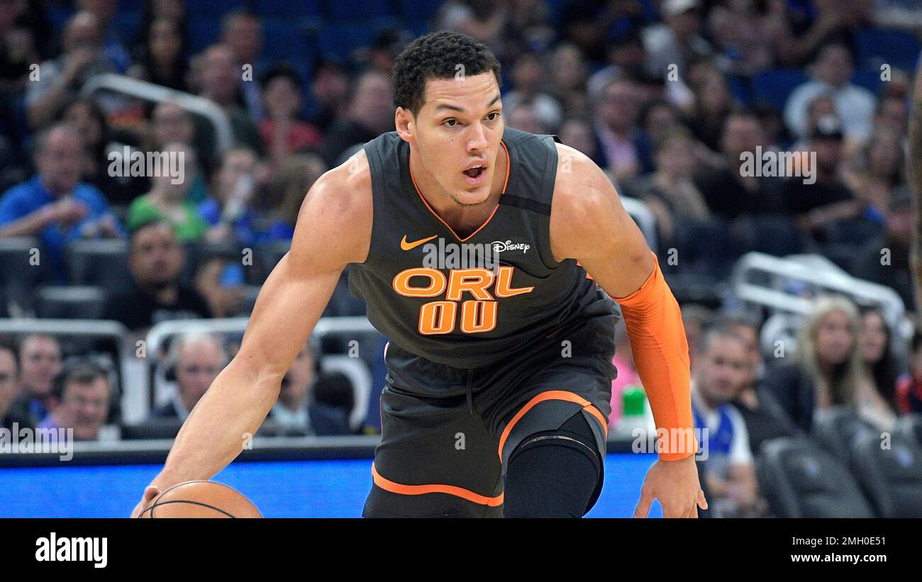 Orlando Magic forward Aaron Gordon (00) gains control of a loose ball ...