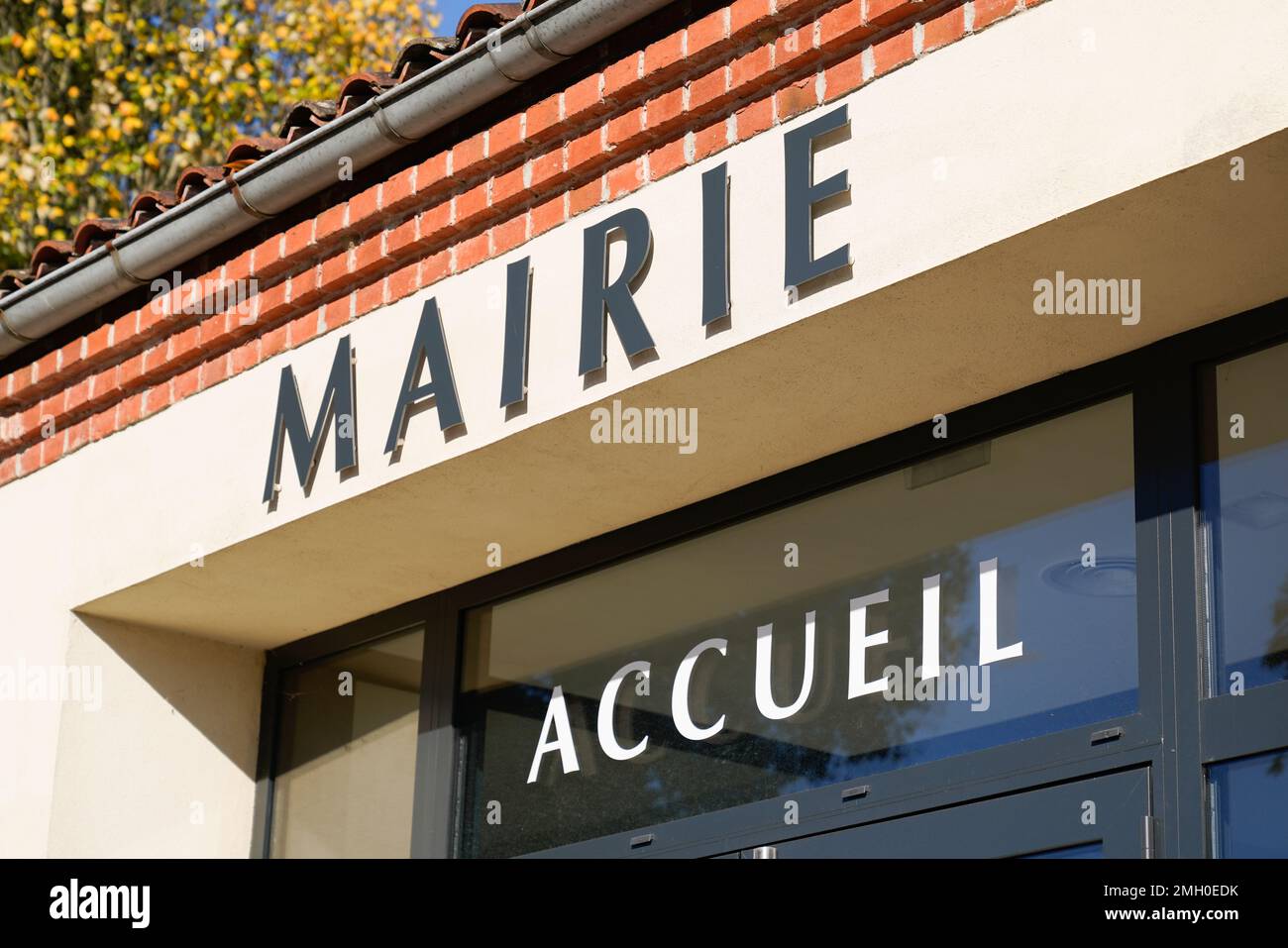city hall facade with mairie accueil means in french town hall entrance ...