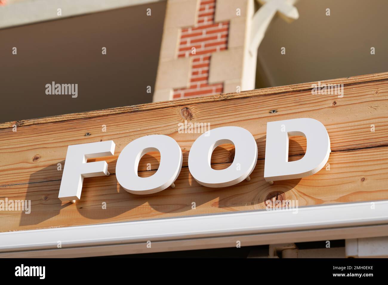 food sign text on restaurant in a city street storefront building Stock ...